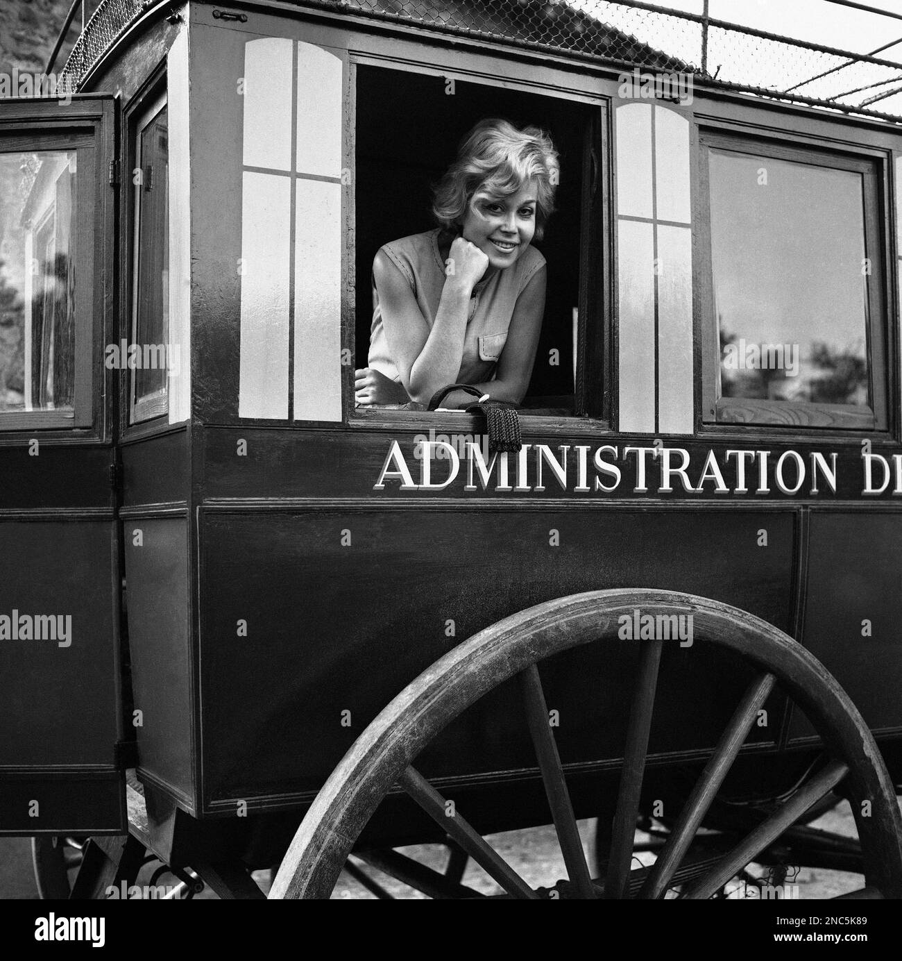 French soprano singer Mathe Altery looks out of a window of a wagon ...