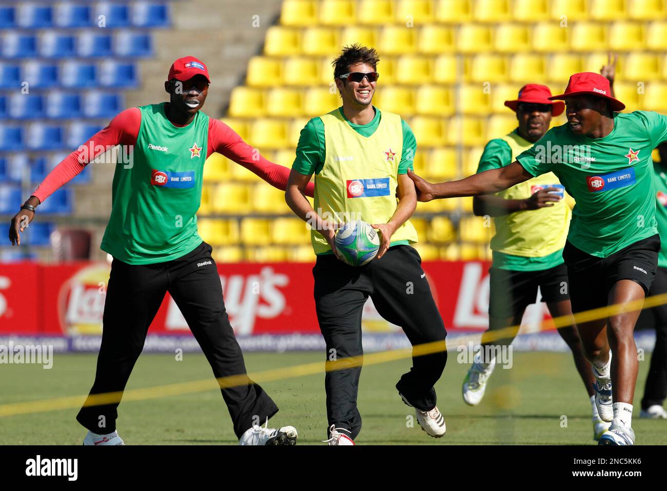 Zimbabwe's' cricketers from left, Chris Mpofu, Craig Ervine and Shingi ...