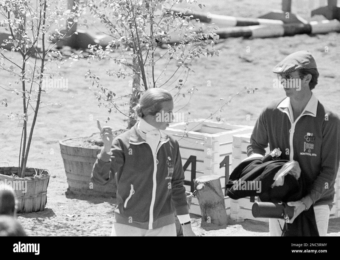 Princess Anne of Great Britain points out something to her husband Capt ...