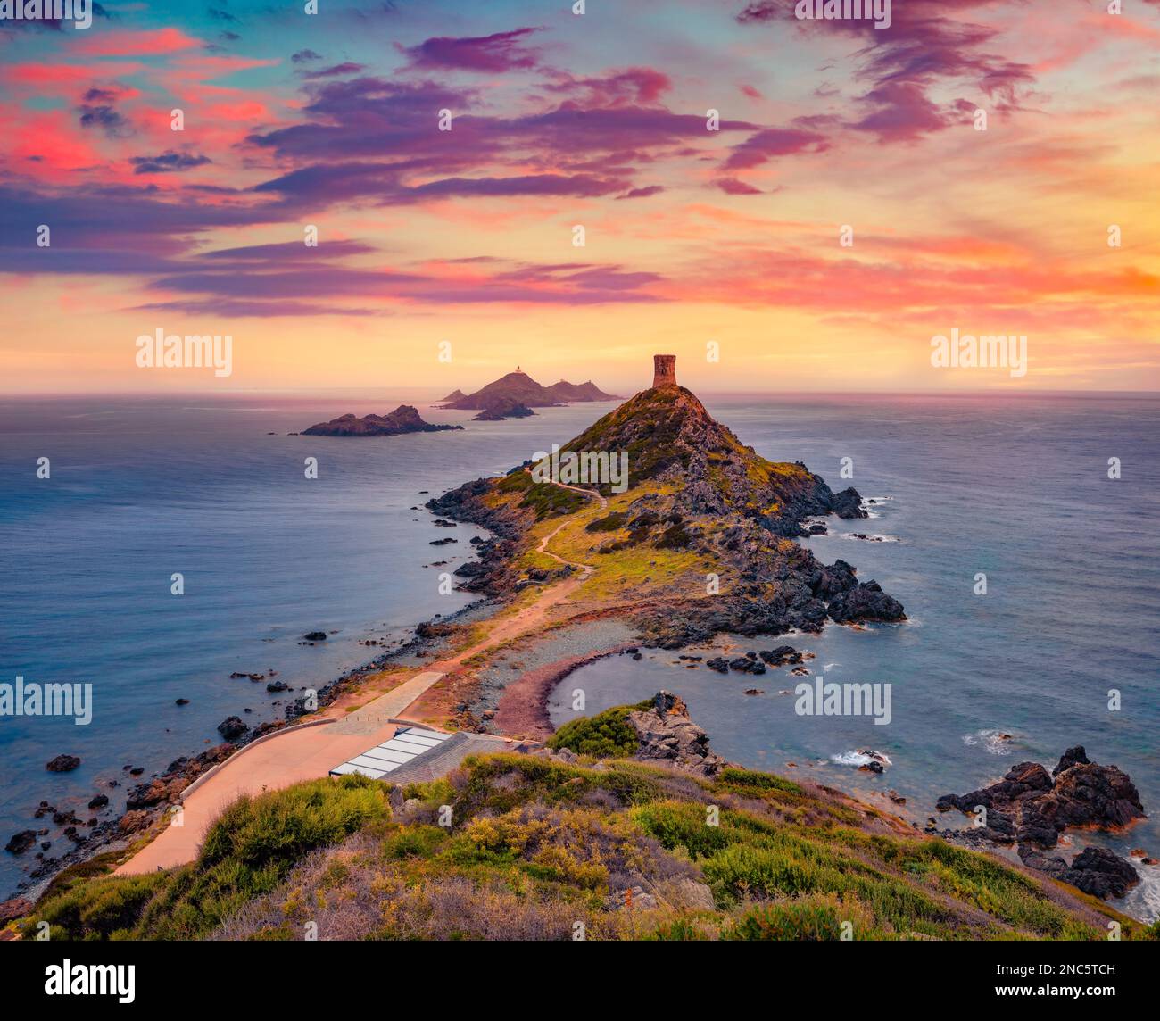 Superb summer sunrise on popular tourist destination Torra di a Parata ...