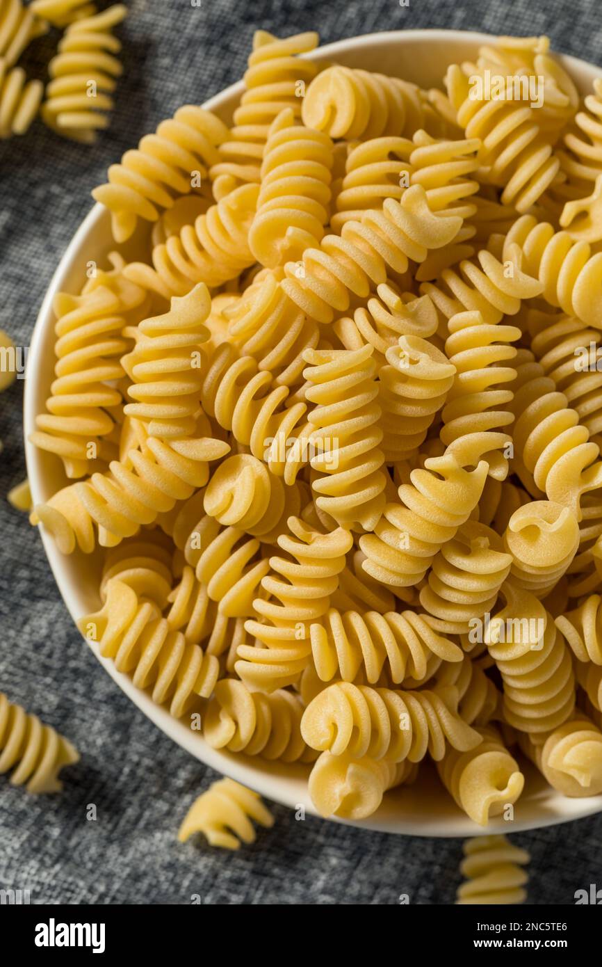 Fusilli dry pasta background hi-res stock photography and images - Alamy