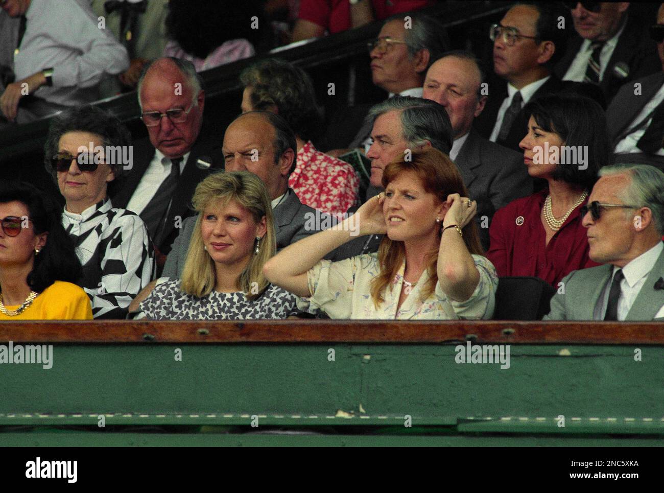 Sarah Ferguson the Duchess of York struggles with her long hair, in the ...