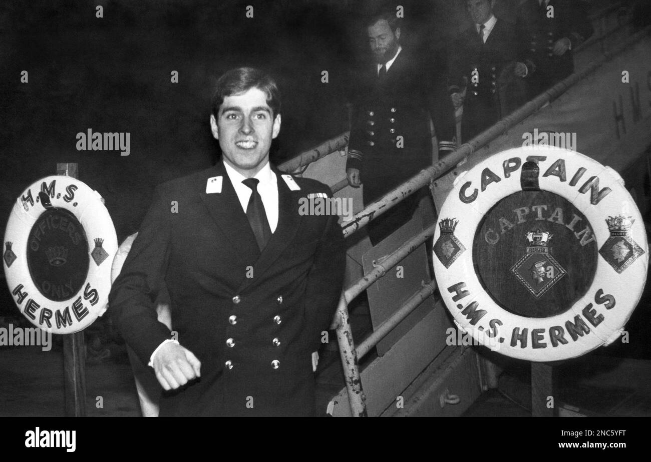 Prince Andrew strides along the dock at Pensacola Naval Base in ...