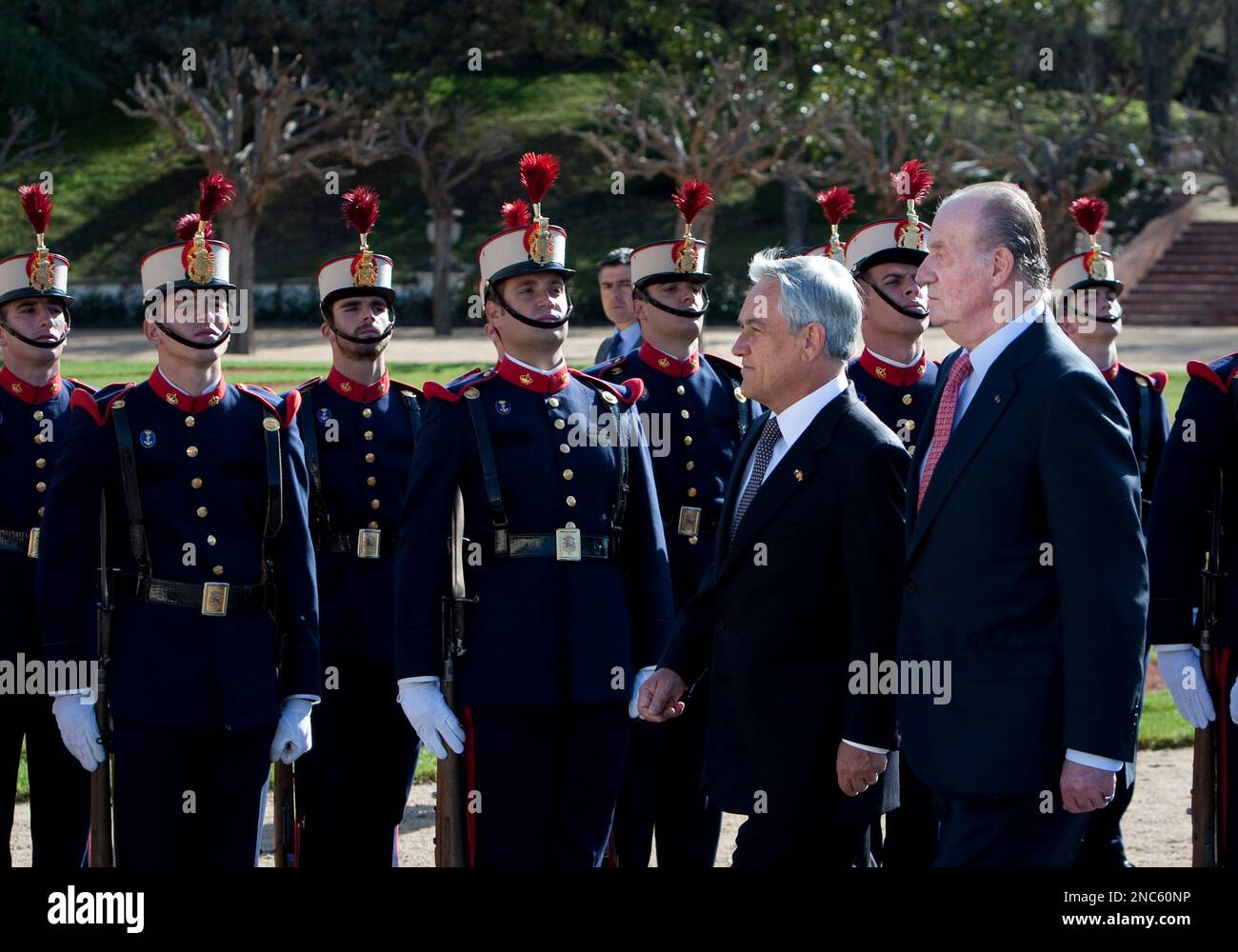 Chile's President Sebastian Pinera, left, and Spanish King Juan Carlos ...