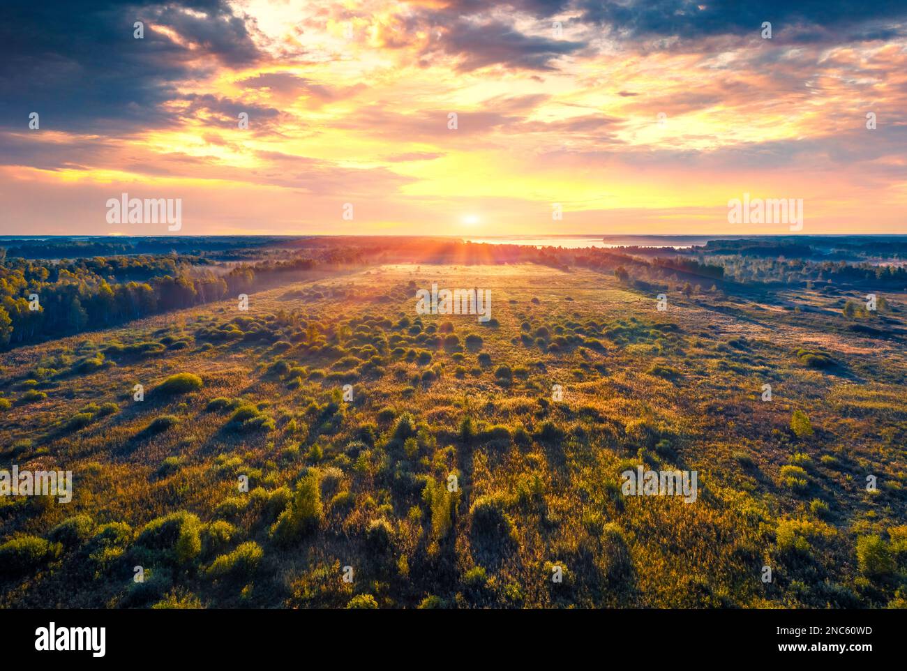 Splendid view from flying drone of Luky lake. Dramatic summer sunrise ...