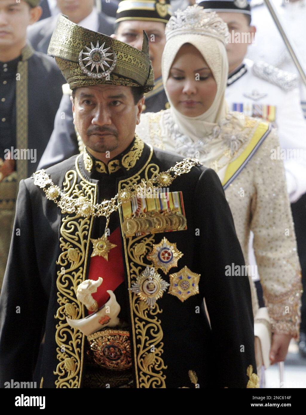 Malaysia's King Sultan Mizan Zainal Abidin, front, and Queen Nur ...