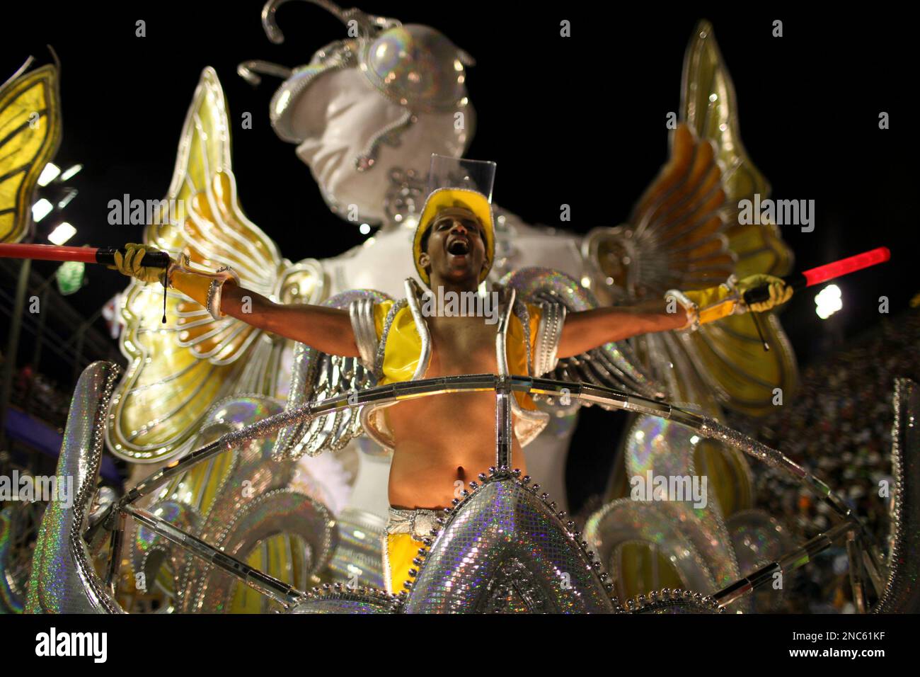 A dancer performs on a Sao Clemente samba school float during carnival ...