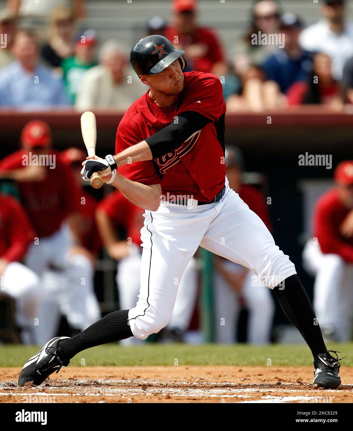 Houston Astros' Hunter Pence swings for a base hit during the first ...