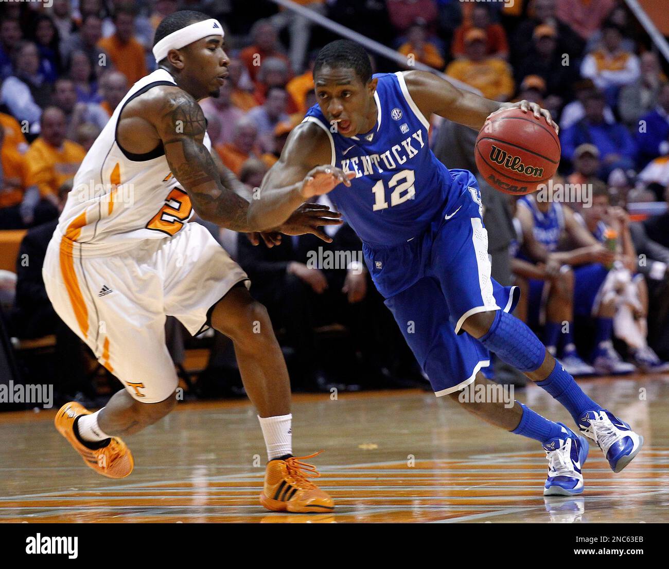 Kentucky's guard Brandon Knight (12) drives while defended by Tennessee ...