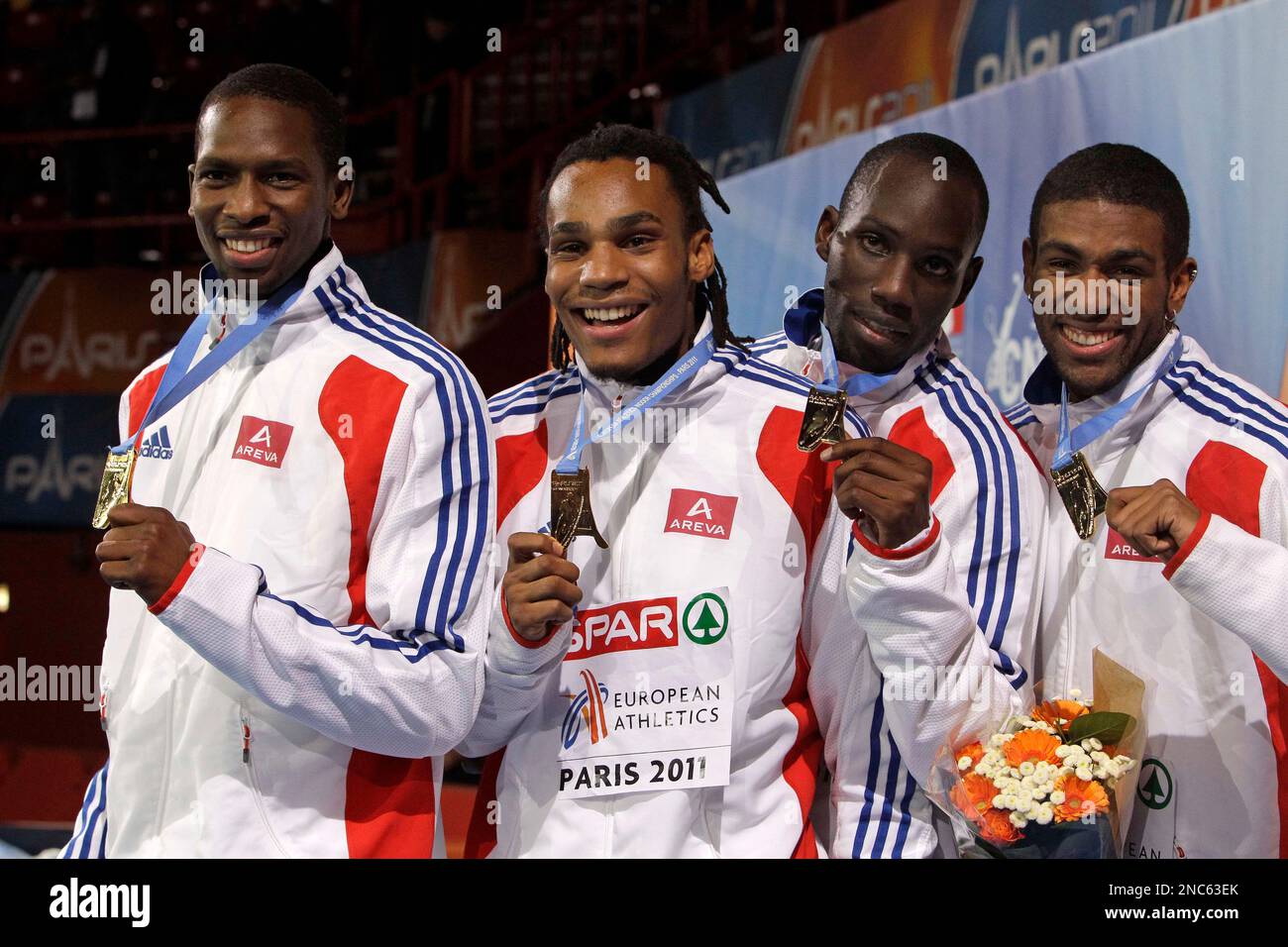 The French team celebrate with their gold medals after the medal ...