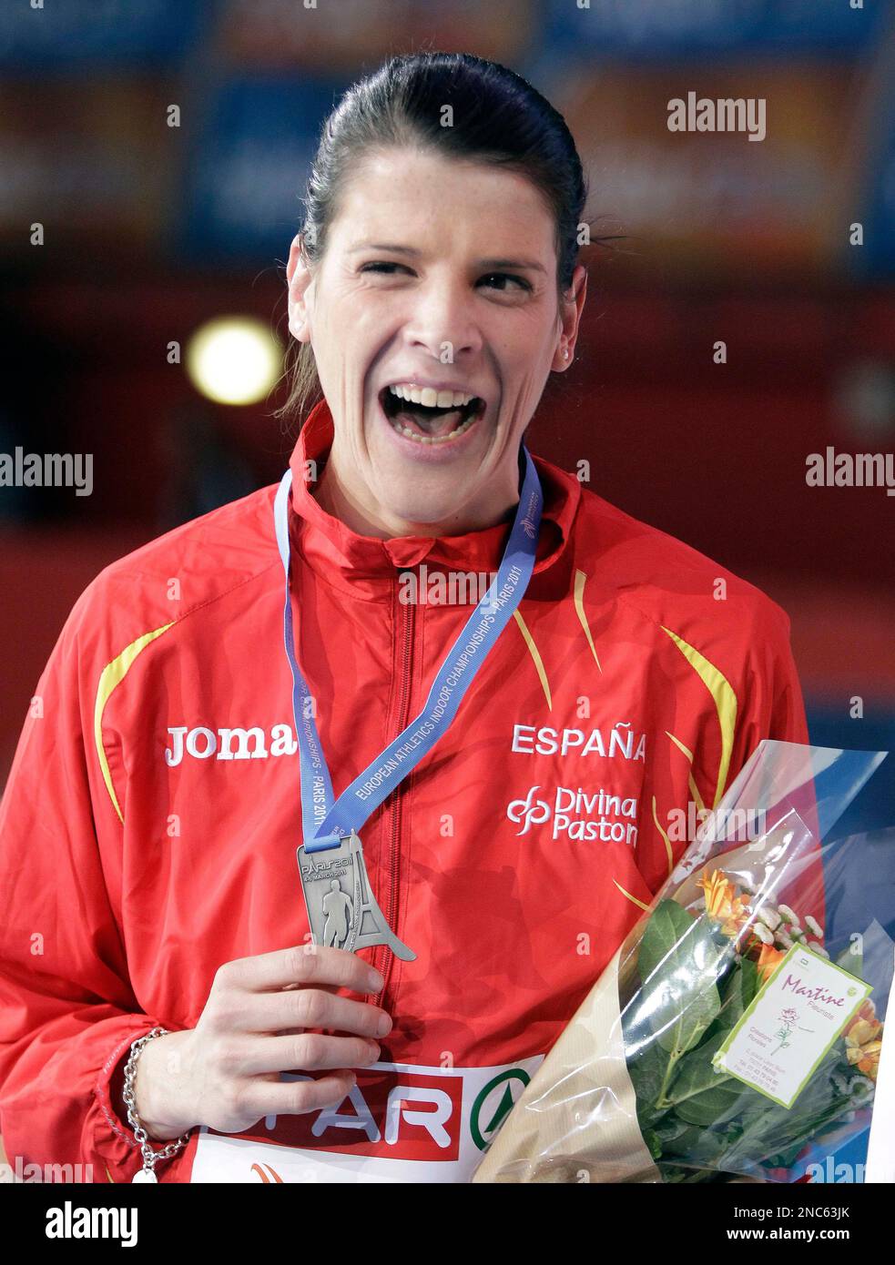 Spain's Ruth Beitia holds the silver medal she won in the final of the ...