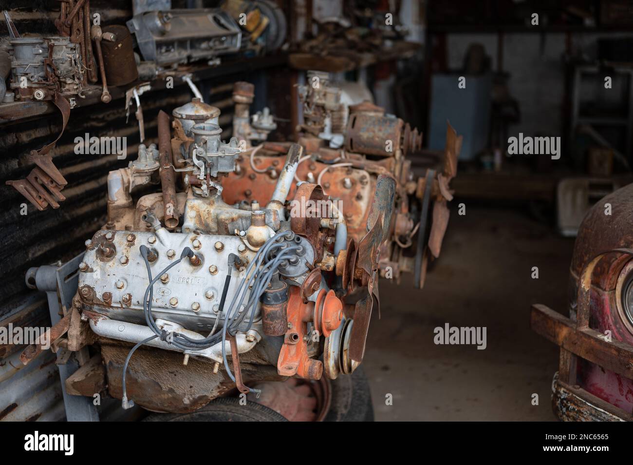 An old abandoned car mechanic shop on the desert highway. Inside there ...