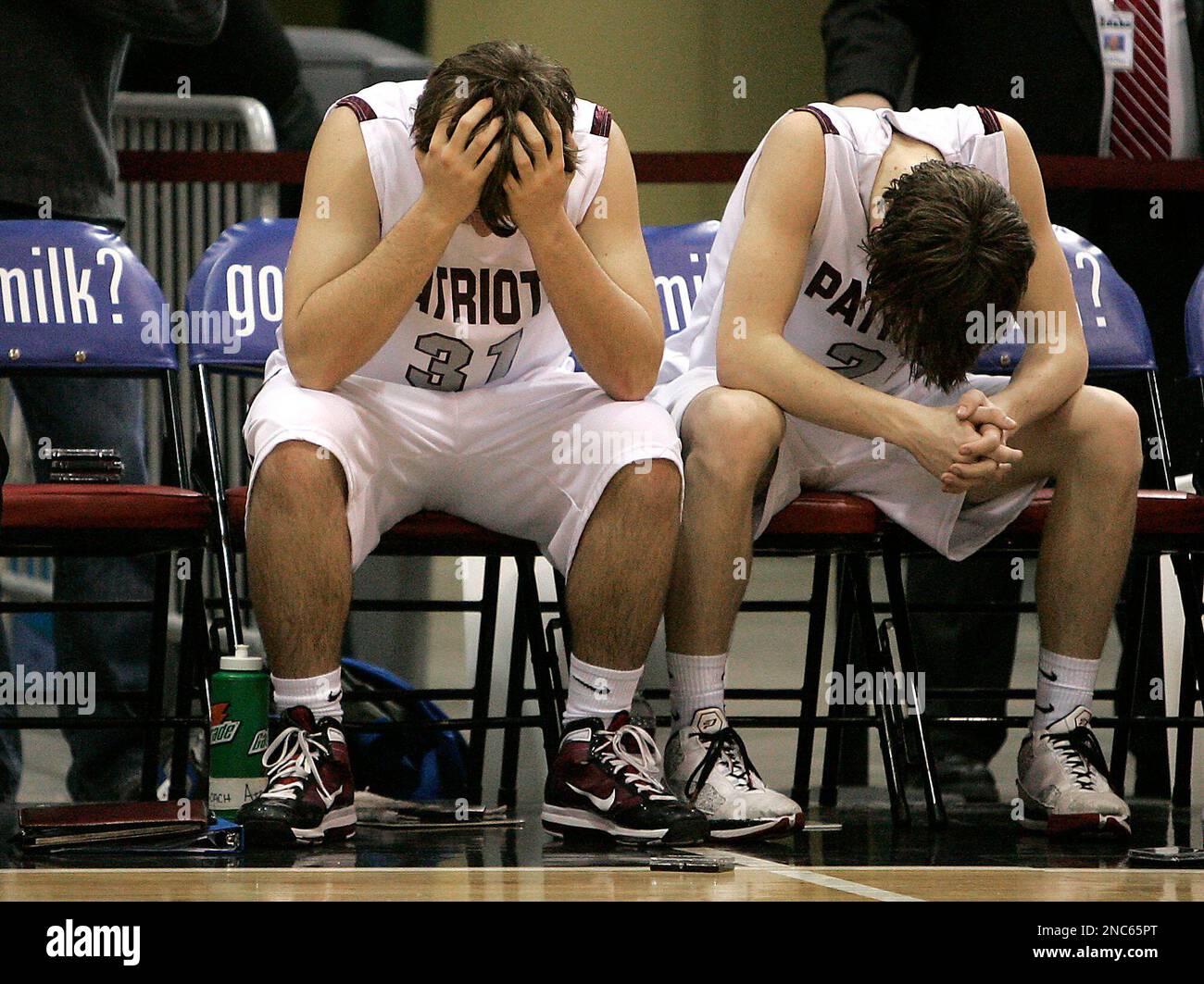 Centennial's Landon Kissinger (31) and Aaron Maffey (21) sit on the ...