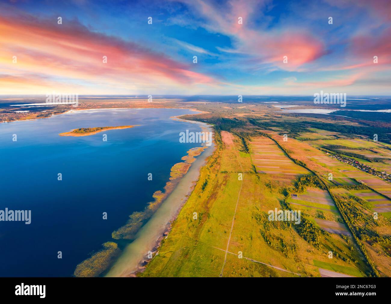 Amazing morning scene of Svityaz lake. Gorgeous summer view from flying ...