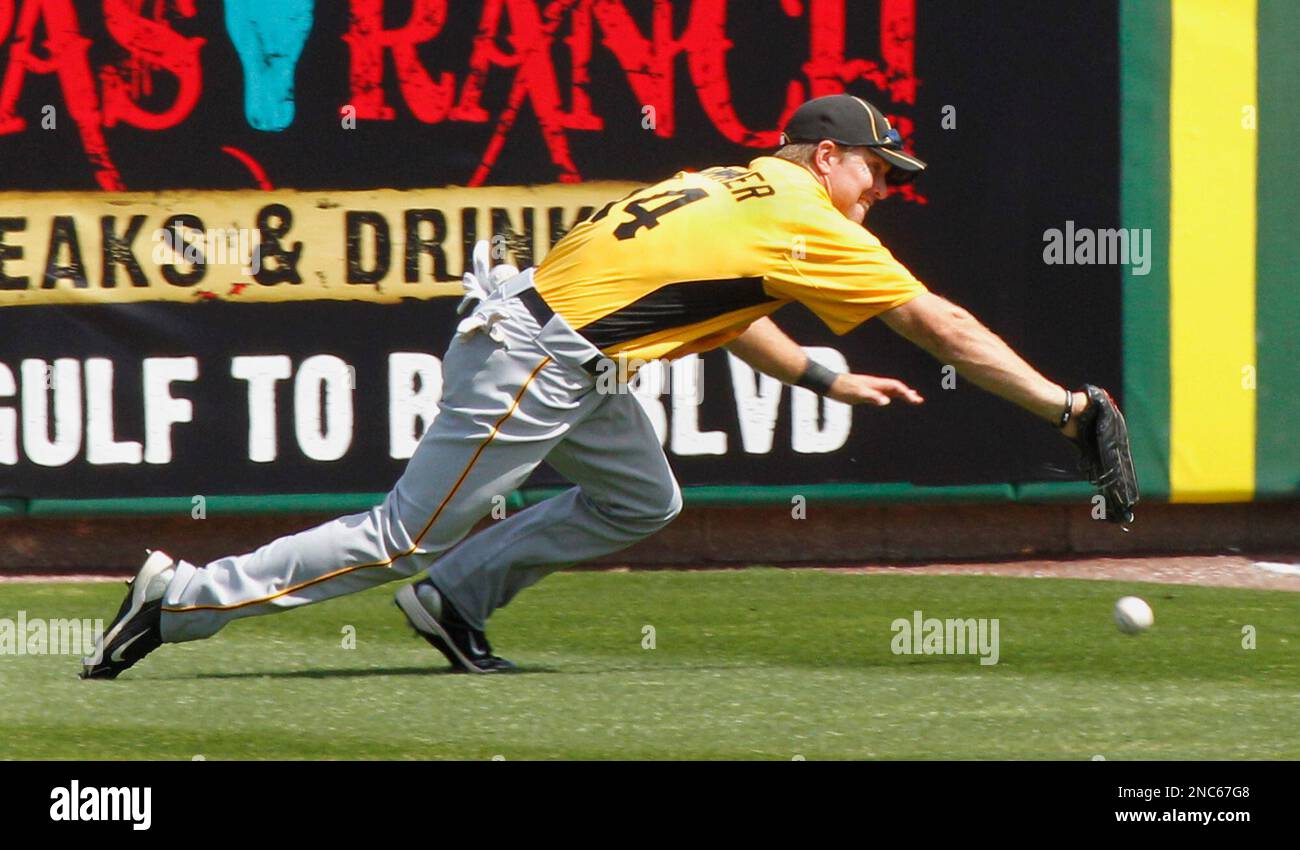 Pittsburgh Pirates right fielder John Bowler dives but can't come up ...