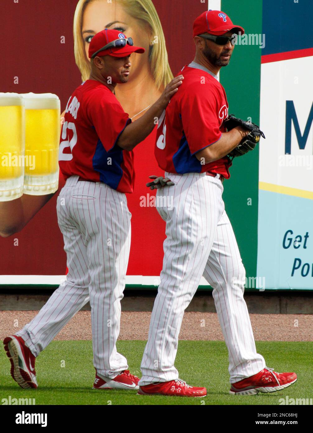 Philadelphia Phillies' Placido Polanco, left, and Raul Ibanez walk in ...