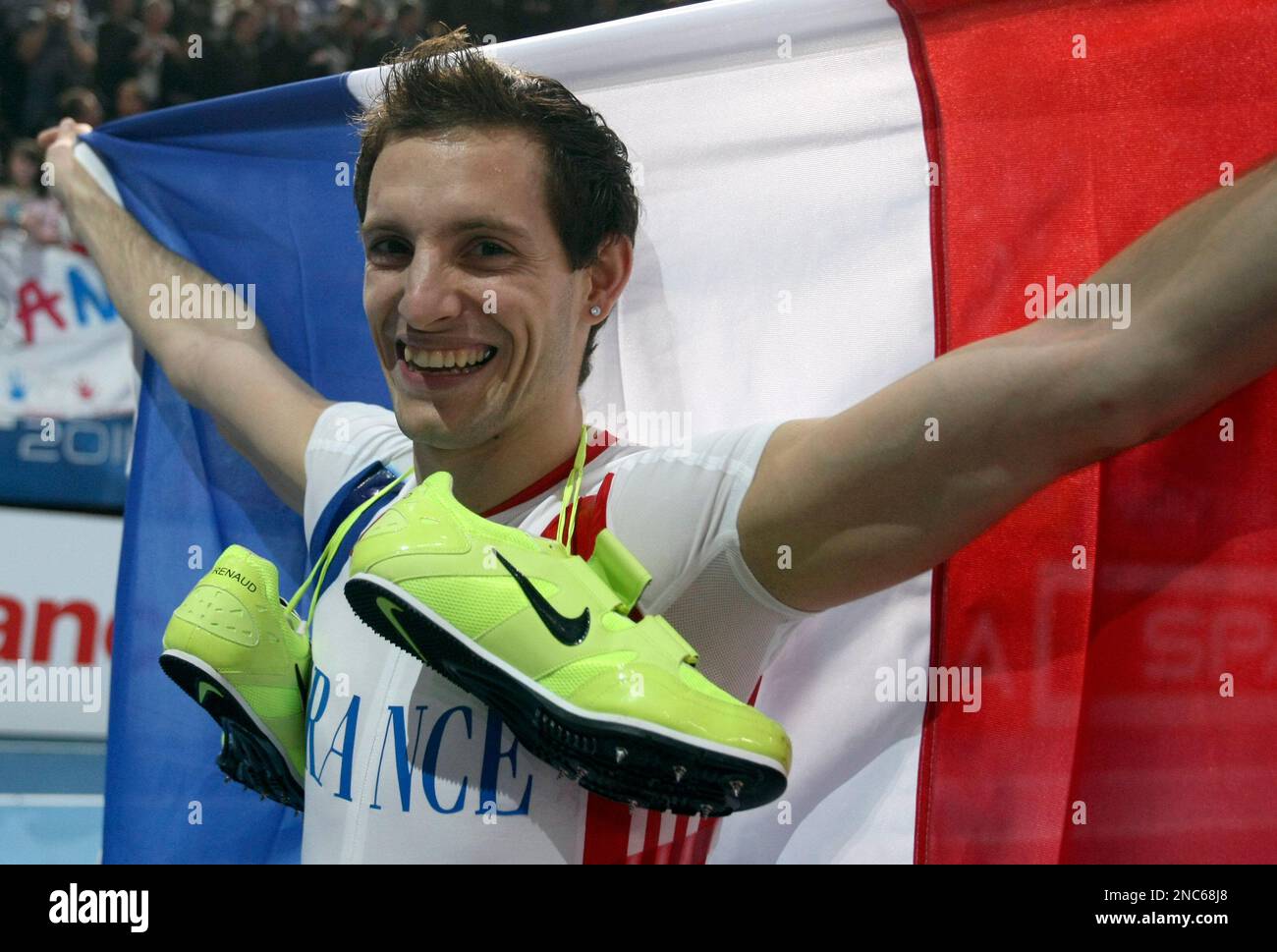 France's Renaud La Villenie, right, smiles after capturing the gold ...