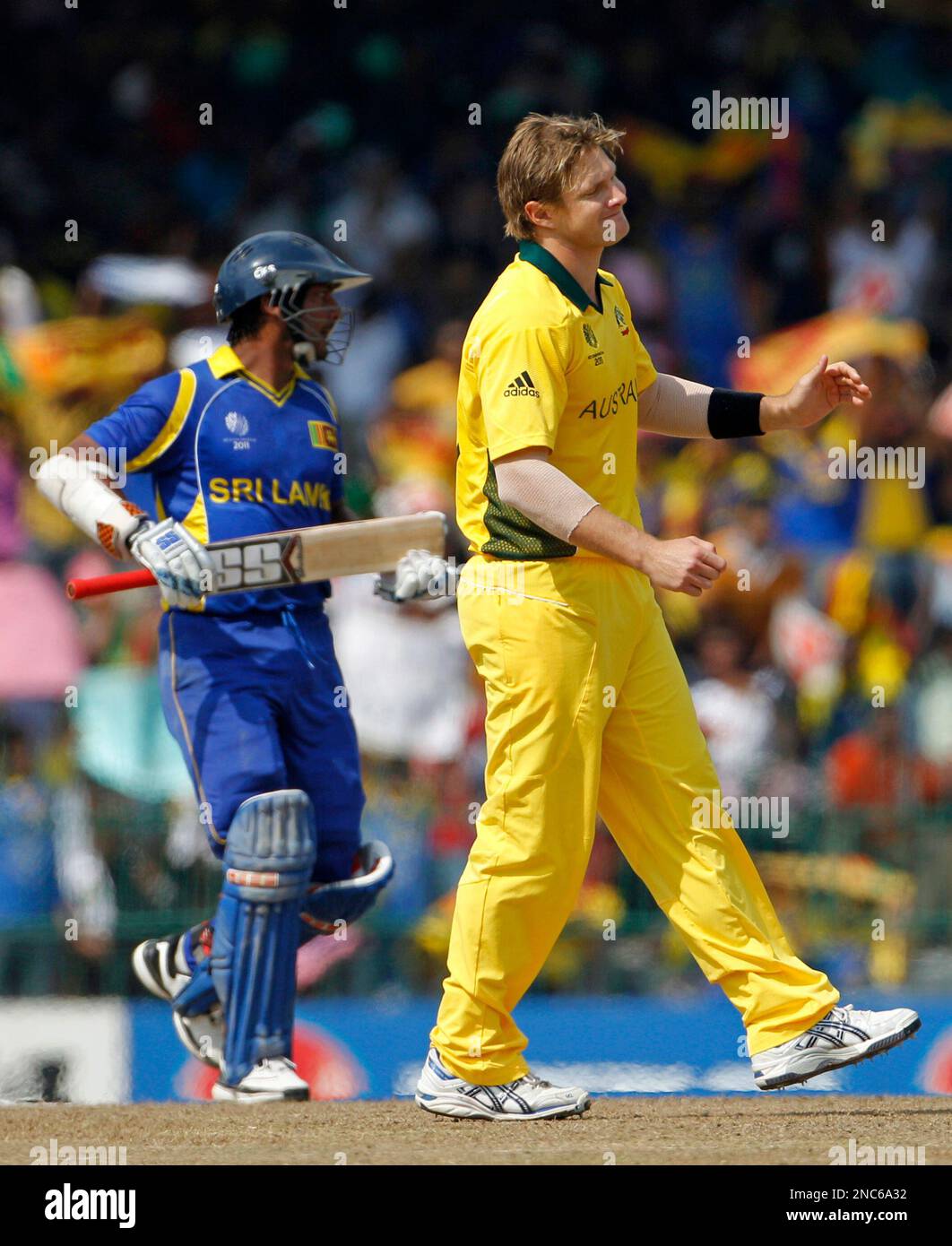Australia's Shane Watson, right, reacts after Sri Lanka's captain Kumar ...