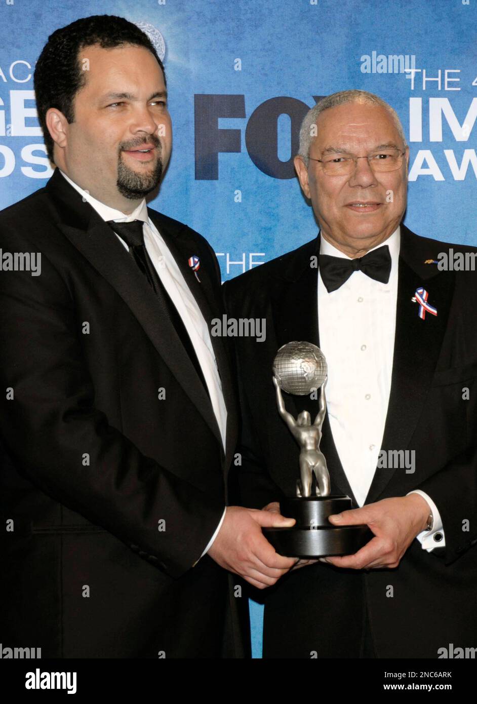 NAACP President Benjamin Todd Jealous, left, and Colin Powell pose ...