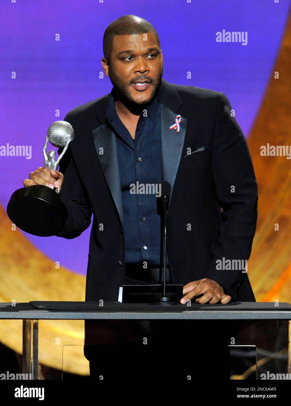 Tyler Perry accepts the award for outstanding motion picture for the ...
