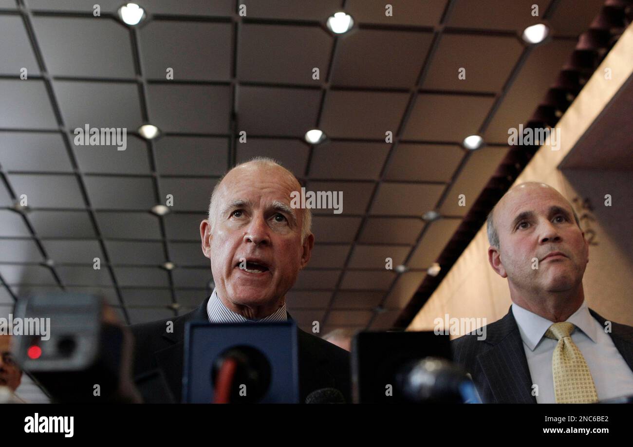 Gov. Jerry Brown, left, speaks at a news conference next to Jim ...
