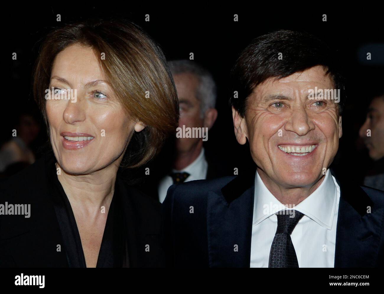 Italian singer Gianni Morandi and his wife Anna Dan are seen in this ...