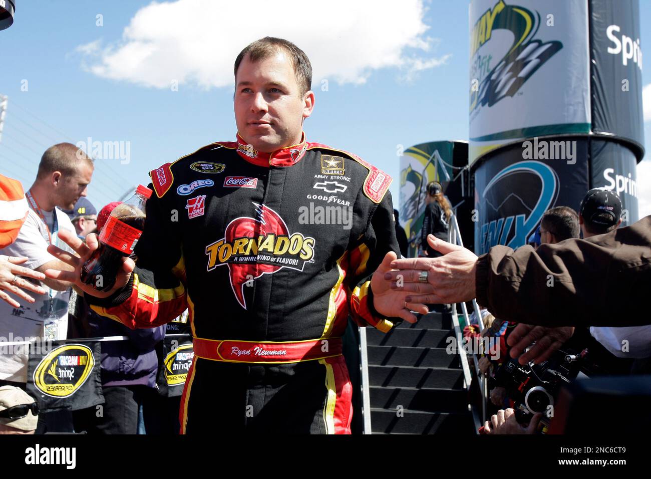 Driver Ryan Newman gets high-fives from fans prior to a NASCAR Sprint ...