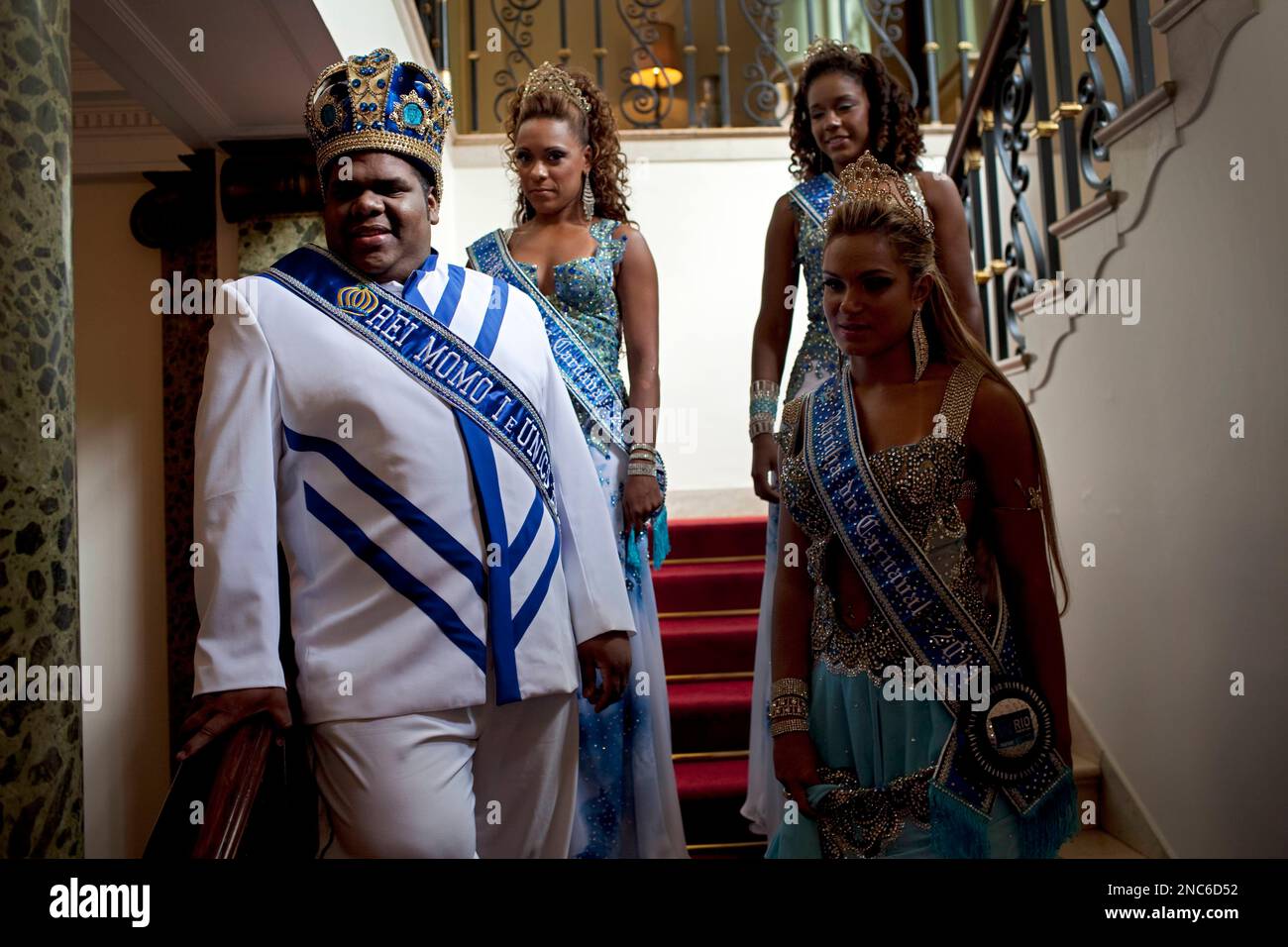 This year's King Momo, the crowned and costumed Milton Rodrigues, front ...