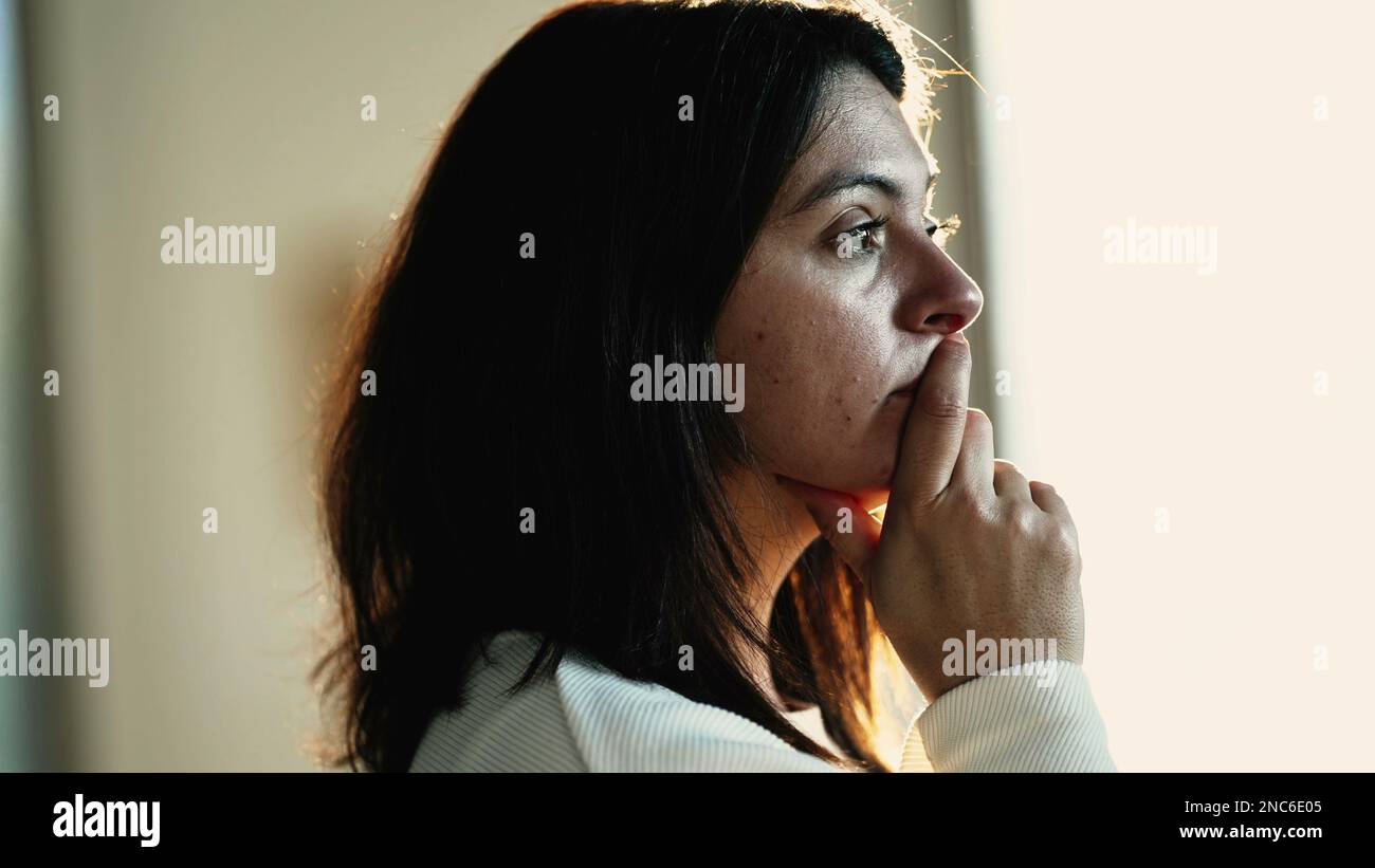 Depressed woman suffering from mental illness at home. Female person ...