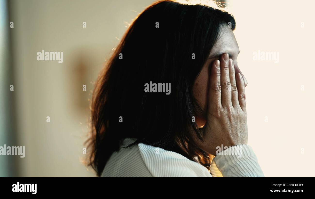 Depressed woman suffering from mental illness at home. Female person ...