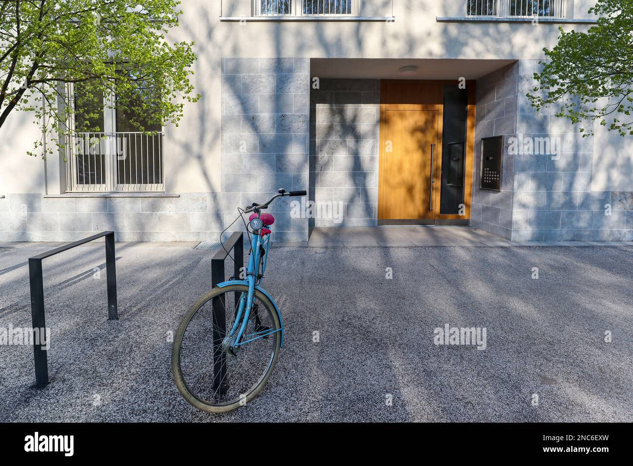 View to entrance door of a modern residential building with new ...