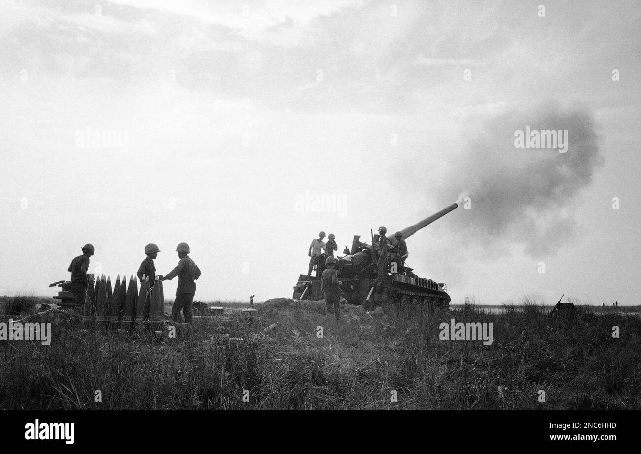 Self-propelled 175mm howitzer fires at North Vietnamese positions near ...