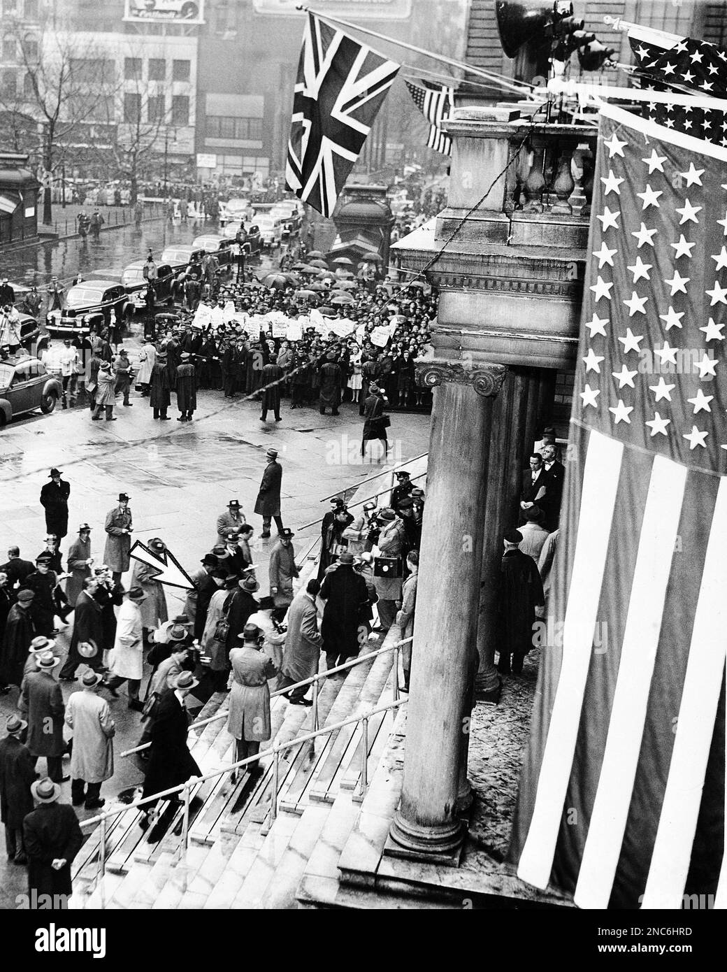 Anti-Churchill demonstrators hold placards at City Hall in New York City on March 15 , 1946 as ...