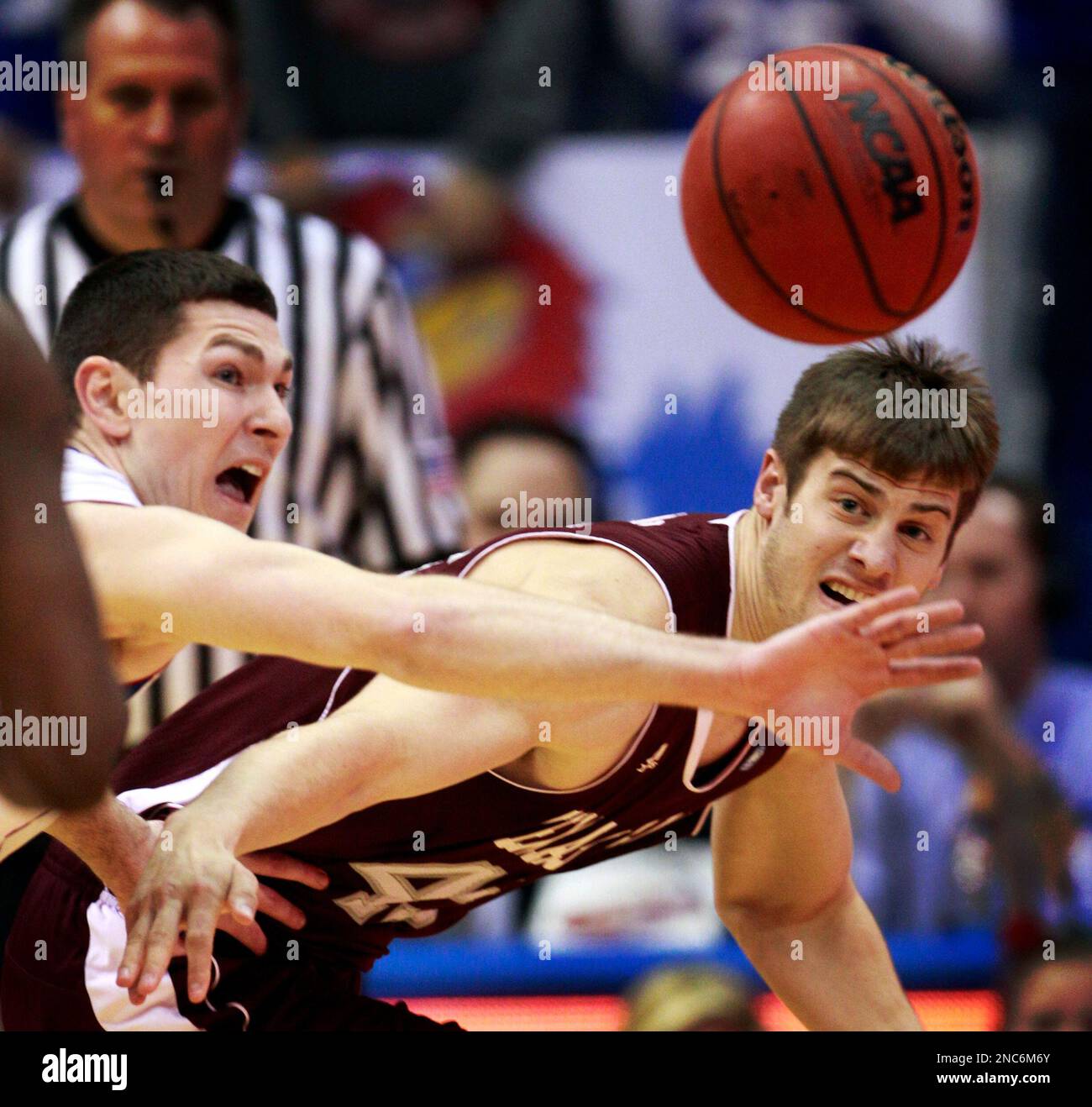 Kansas guard Tyrel Reed, left, keeps the ball away from Texas A&M ...