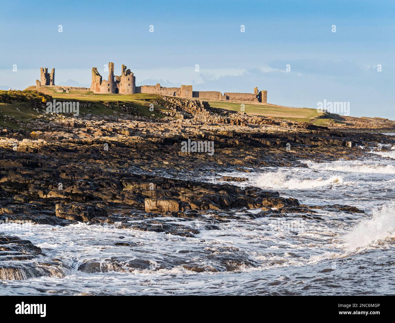 Dunstanburgh Castle on the Northumberland coast Stock Photo - Alamy