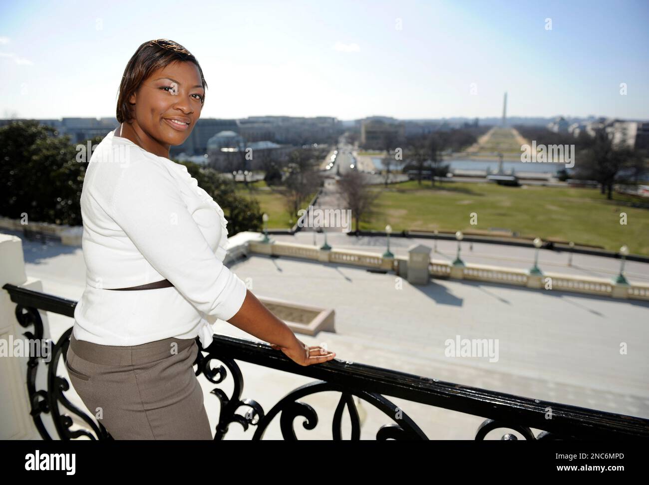 Top Chef contestant Tiffany Derry poses for a photo with the National ...