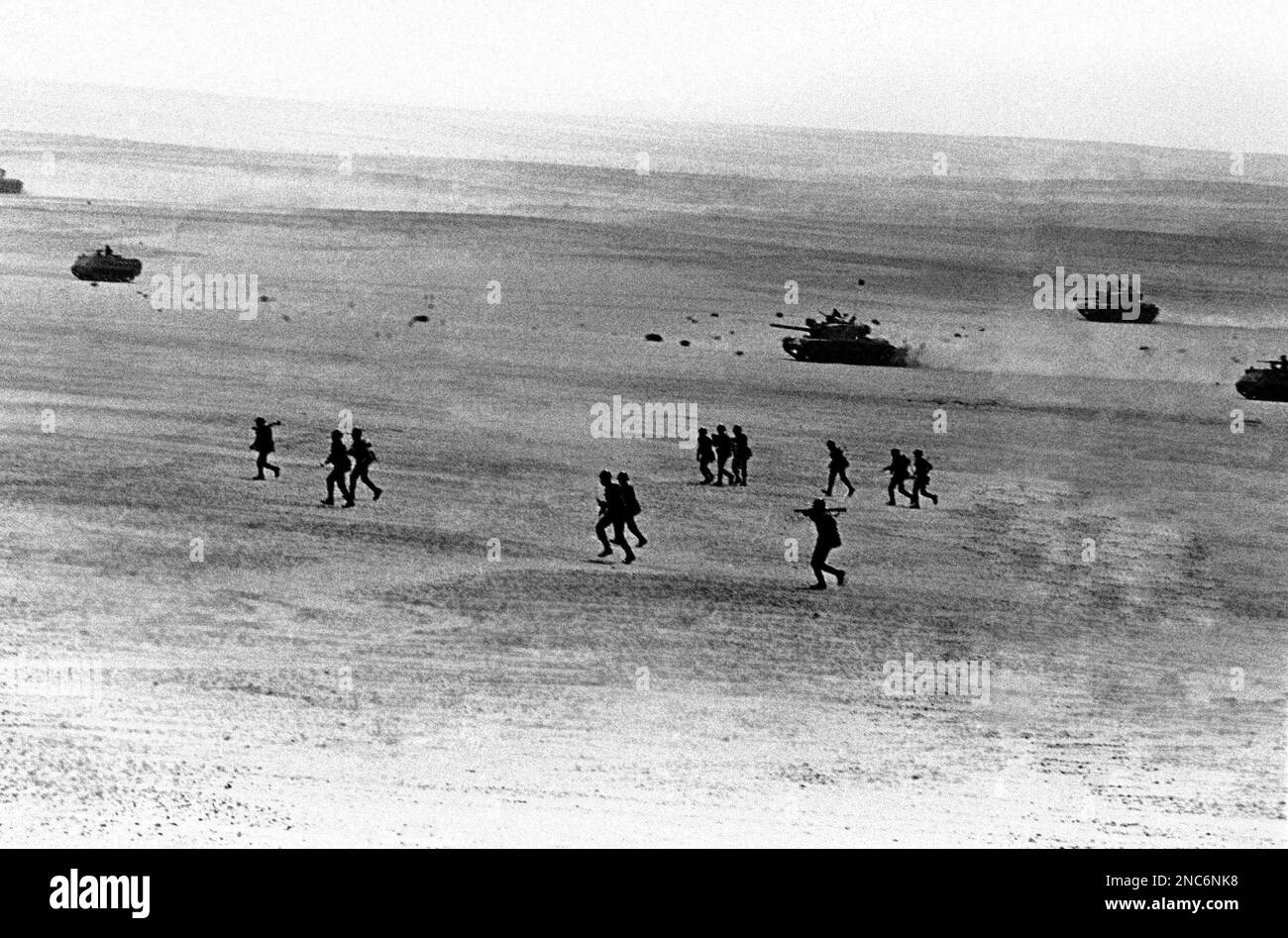 American and Egyptian infantry units advancing on a mock target during ...