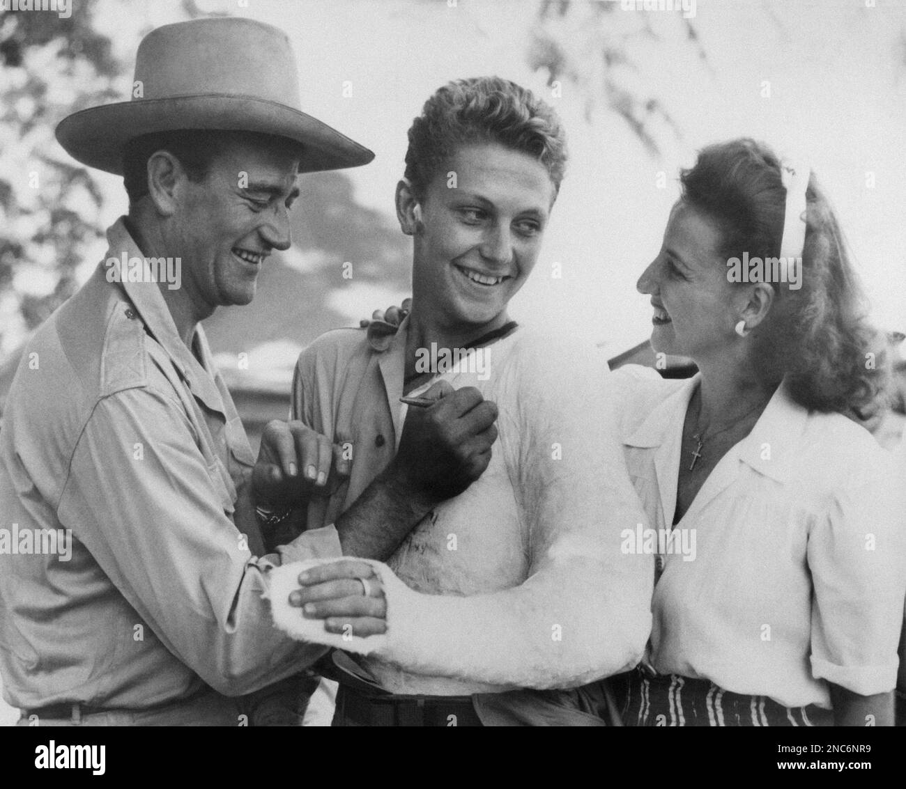 Marine Pfc. Albert Adams, center, of East St. Louis, Ill., wounded in ...