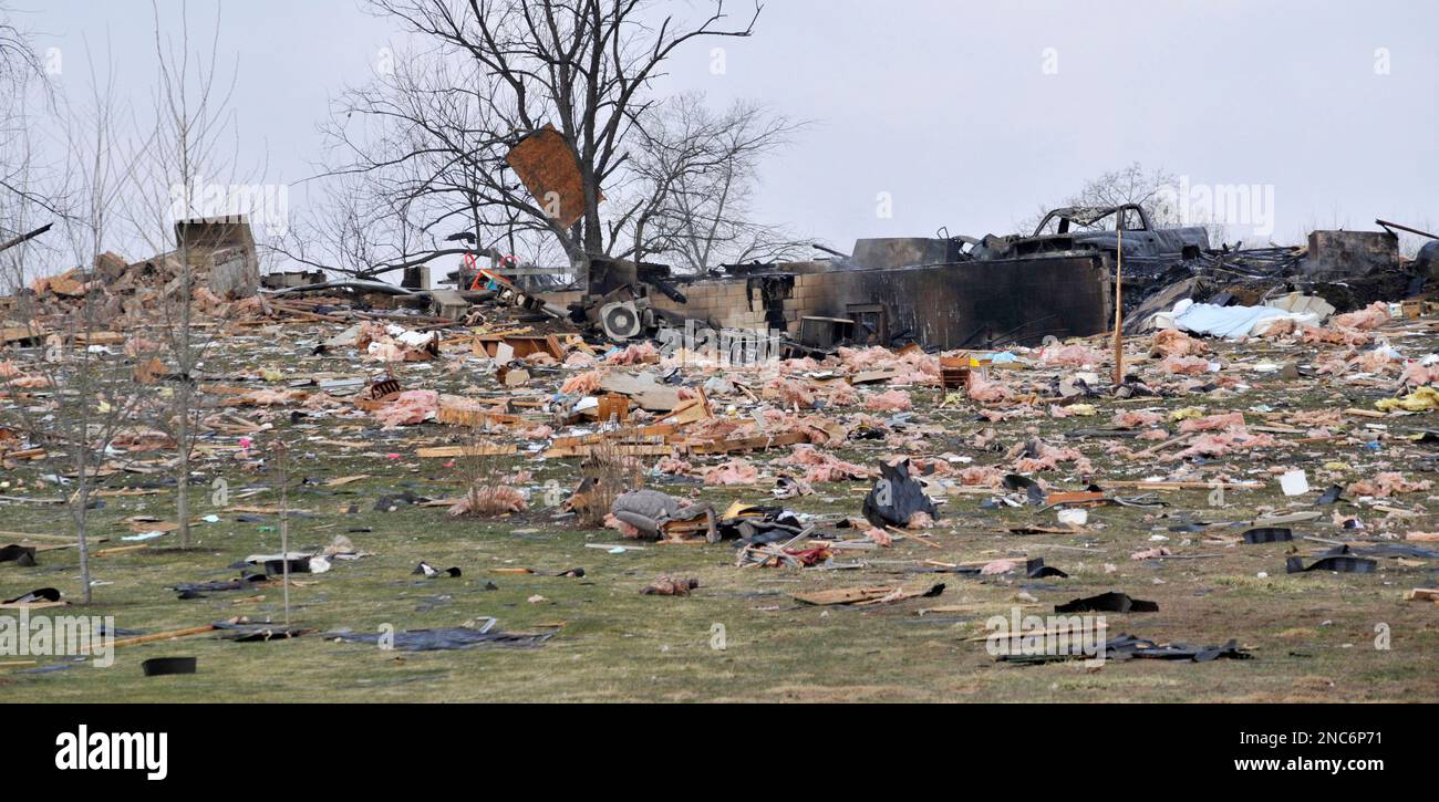 The scene of a house explosion where officials say a woman and her ...