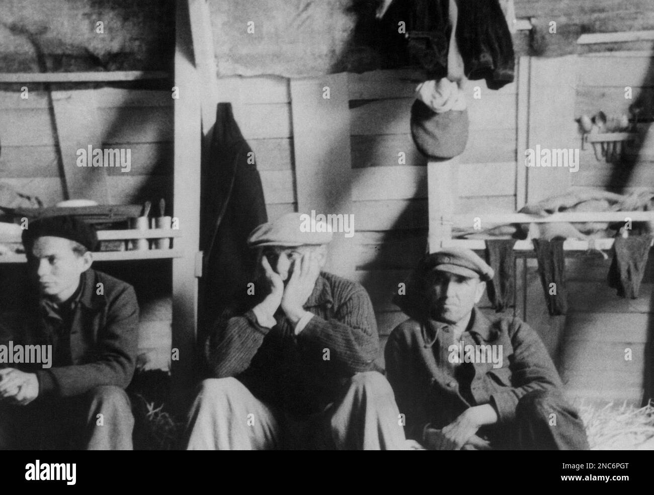 Three Frenchmen sit in silence in a Nazi concentration camp on May 30 ...