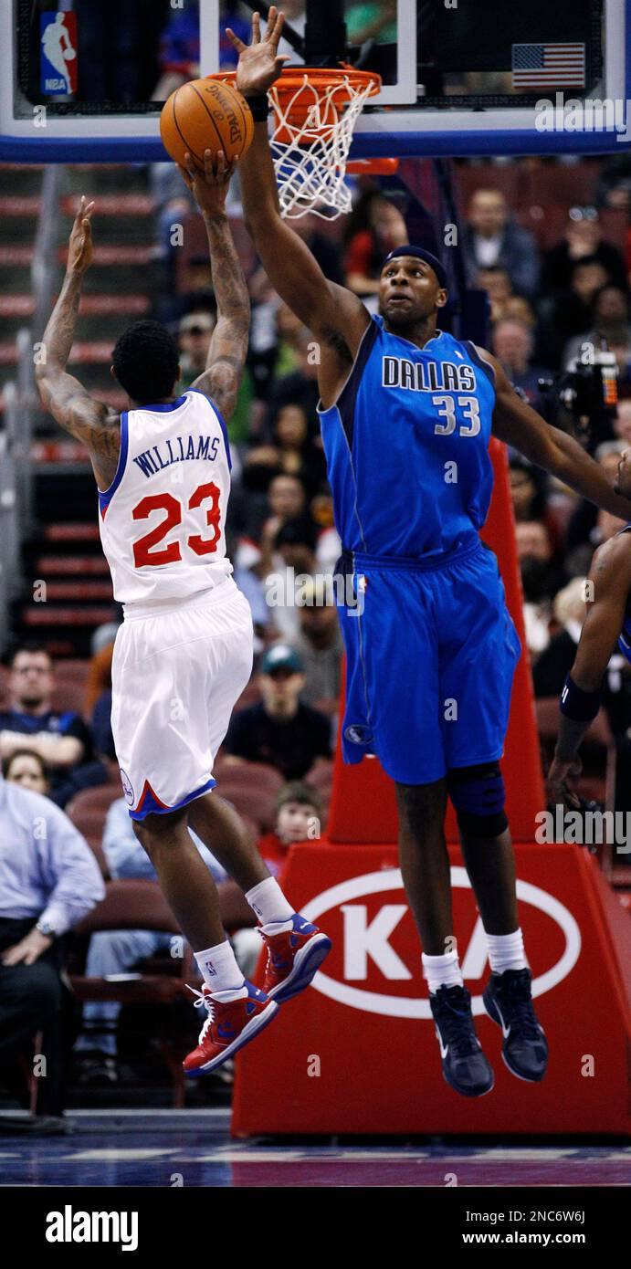 Philadelphia 76ers' Lou Williams (23) has his shot blocked by Dallas ...