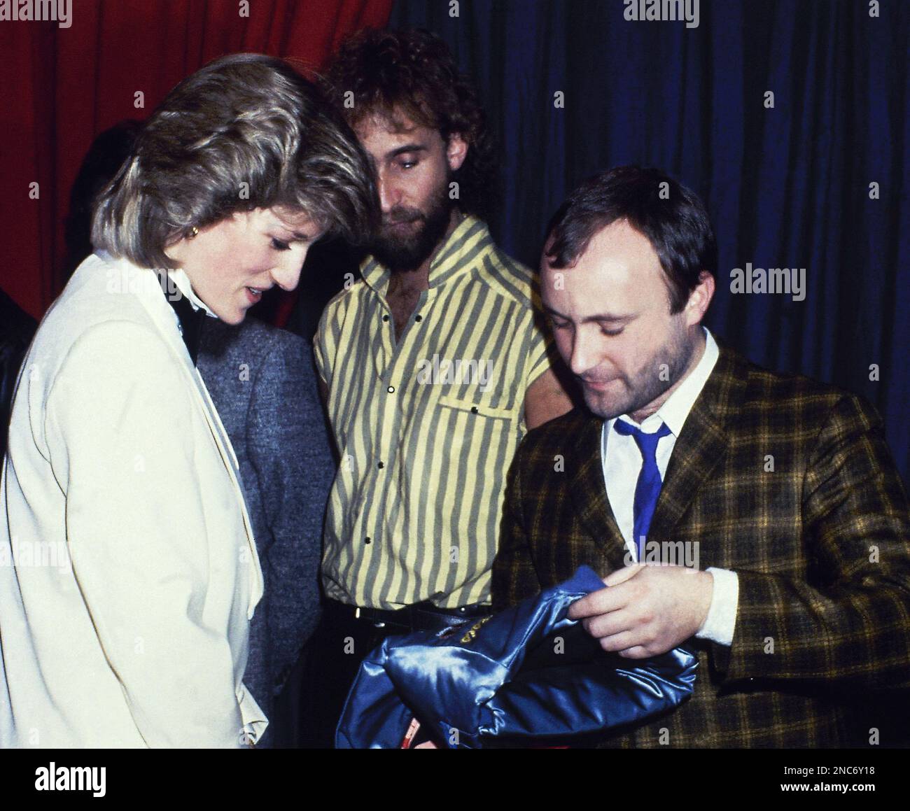 Princess Diana pictured with pop group “Genesis” in February 1984. Left ...