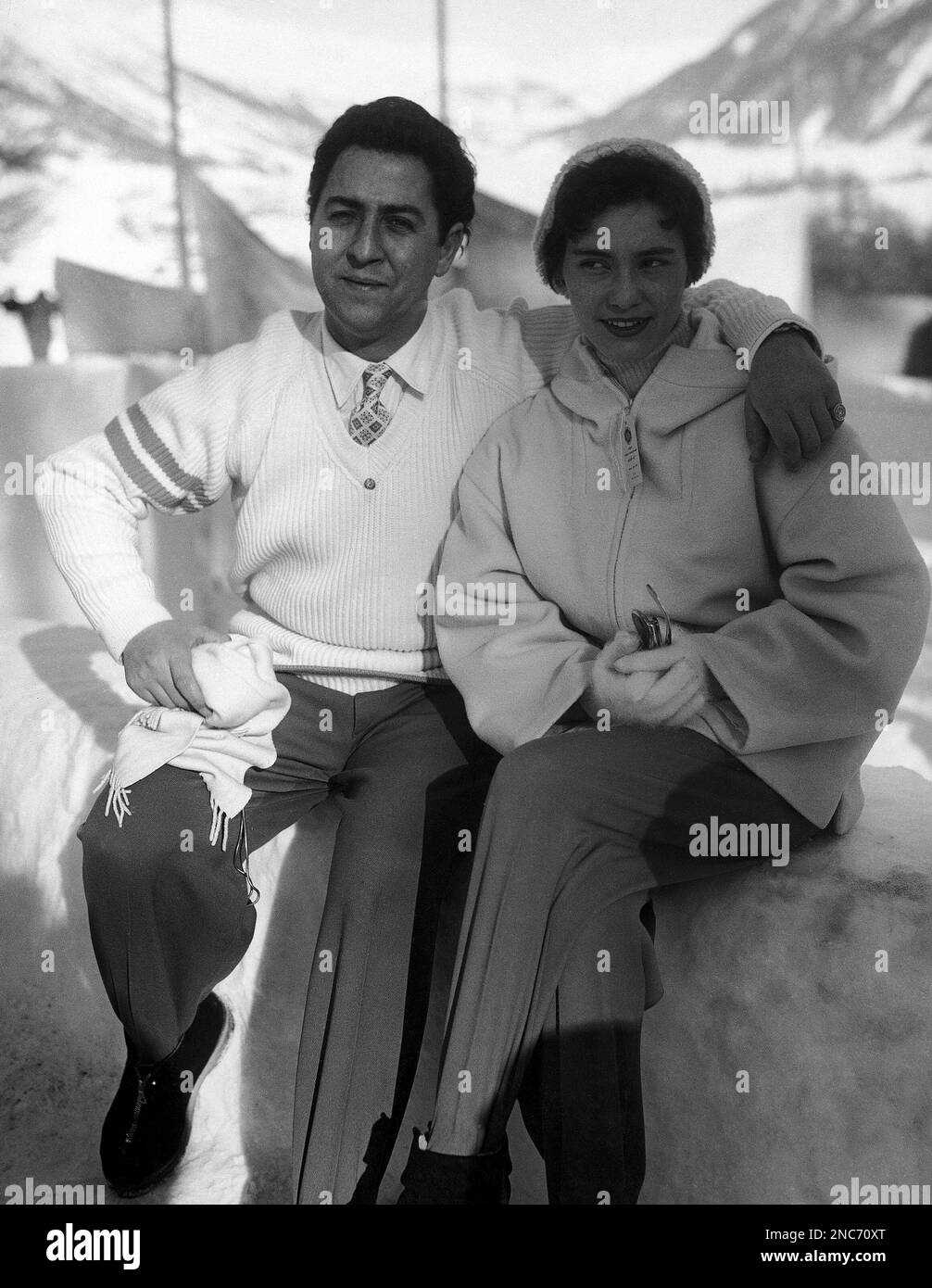 Swiss singer, actor and TV host Vico Torriani puts an arm around his ...