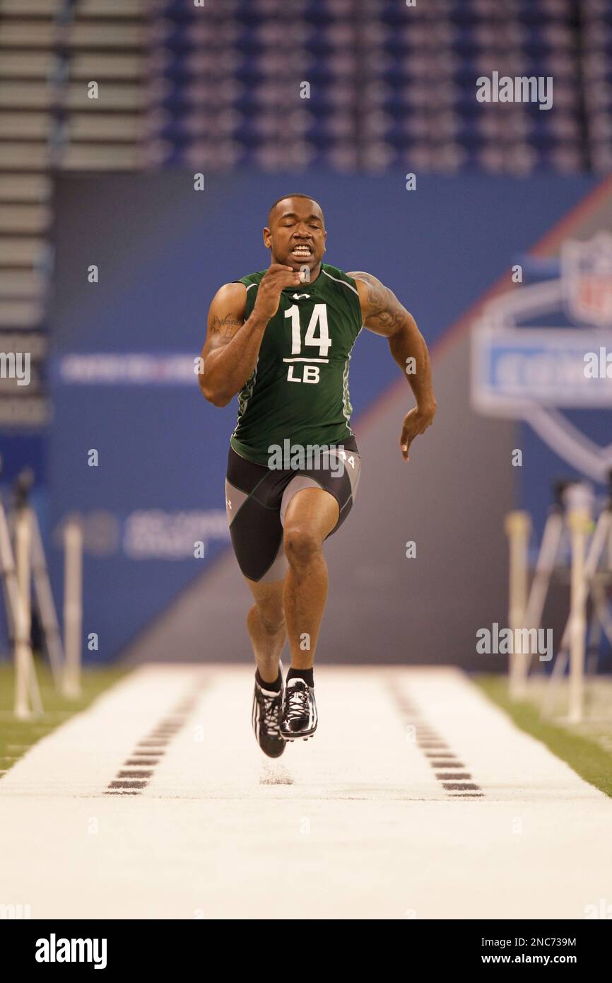 Oklahoma State linebacker Orie Lemon runs a drill at the NFL football ...