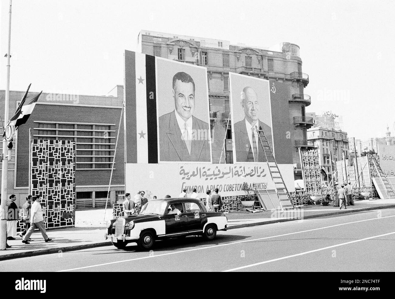 Huge portraits of Russian Premier Nikita Khrushchev and United Arab ...