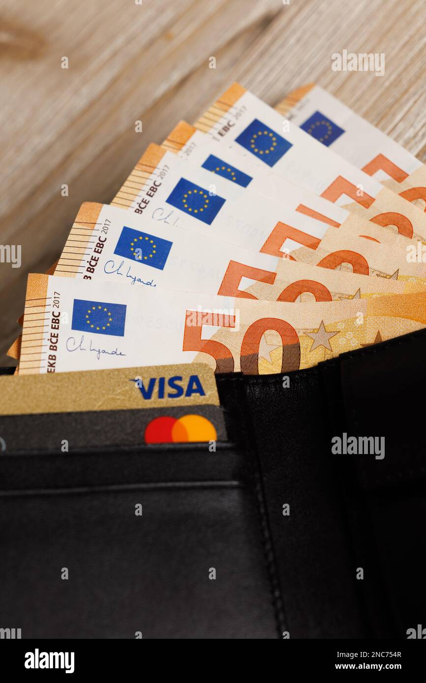 Brussels, Belgium, February 2023 -EURO banknotes in a wallet with with ...