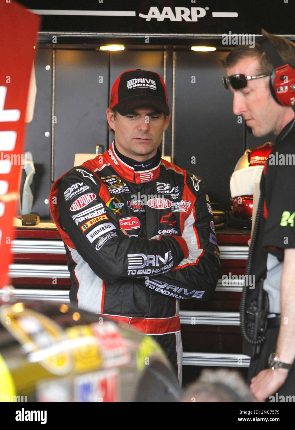 Driver Jeff Gordon, left, talks with crew chief Alan Gustafson in the ...