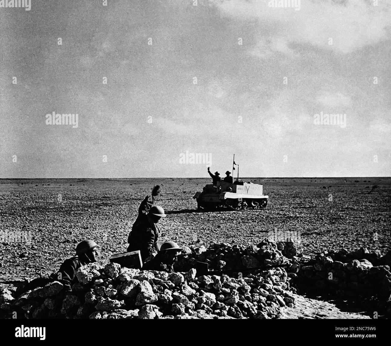 A French armored vehicle approaches an outpost in Libya, on May 26 ...