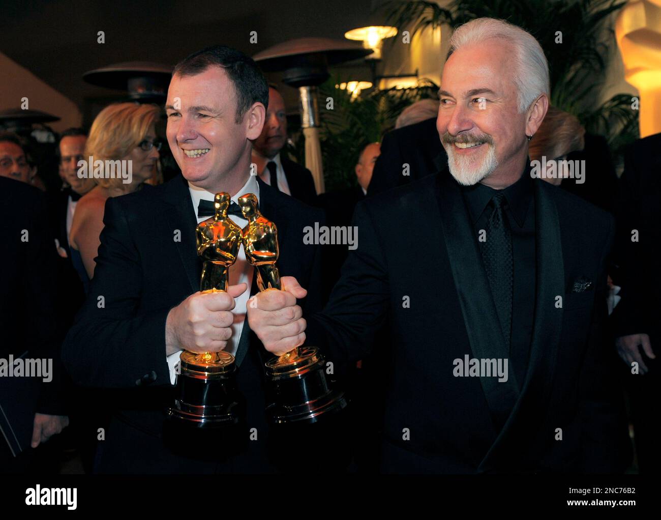 Dave Elsey, left, and Rick Baker are seen with their academy awards for ...
