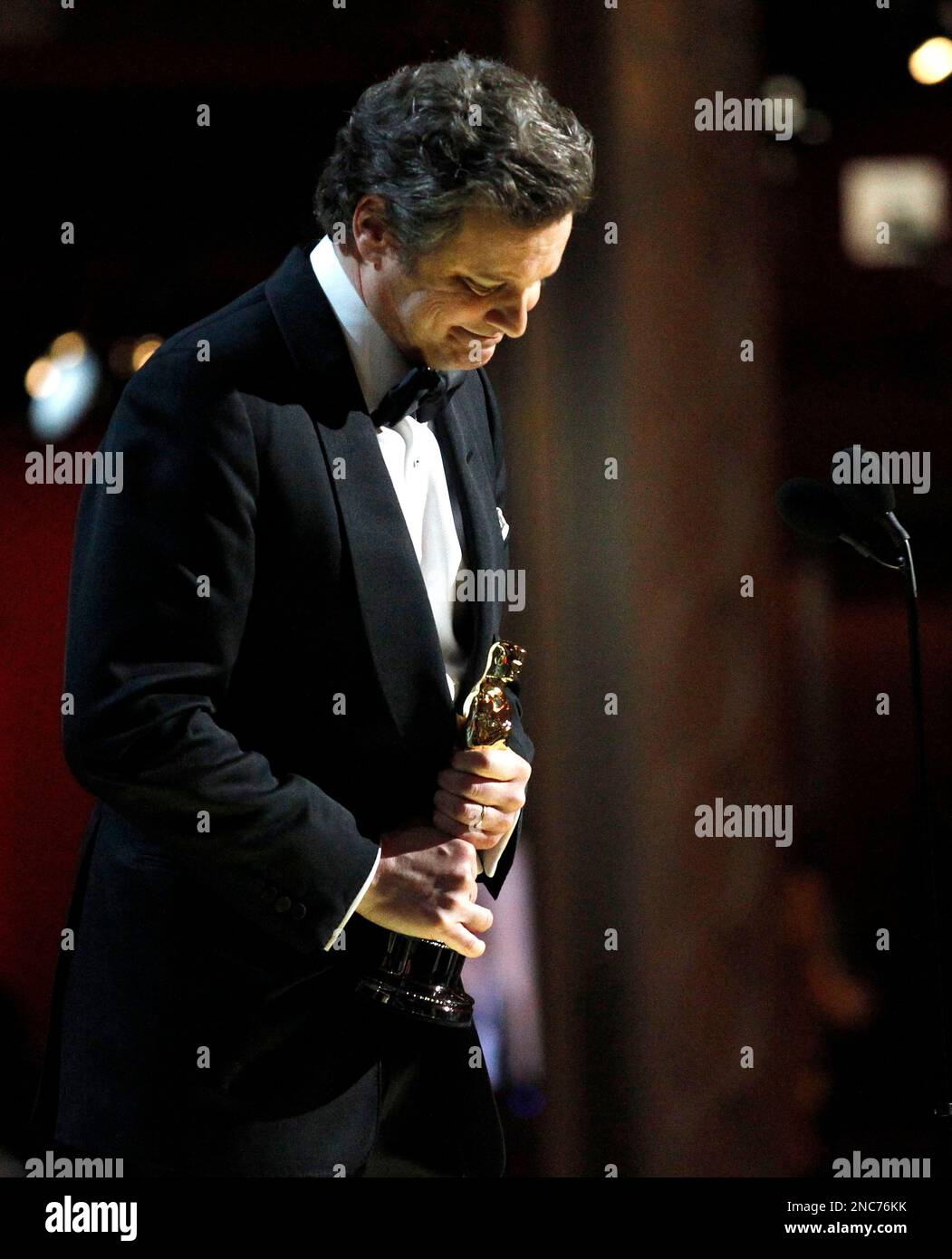 Colin Firth accepts the Oscar for best performance by an actor in a ...